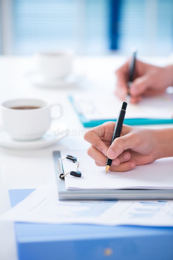 Making notes stock photo. Image of office, colleagues - 32672396