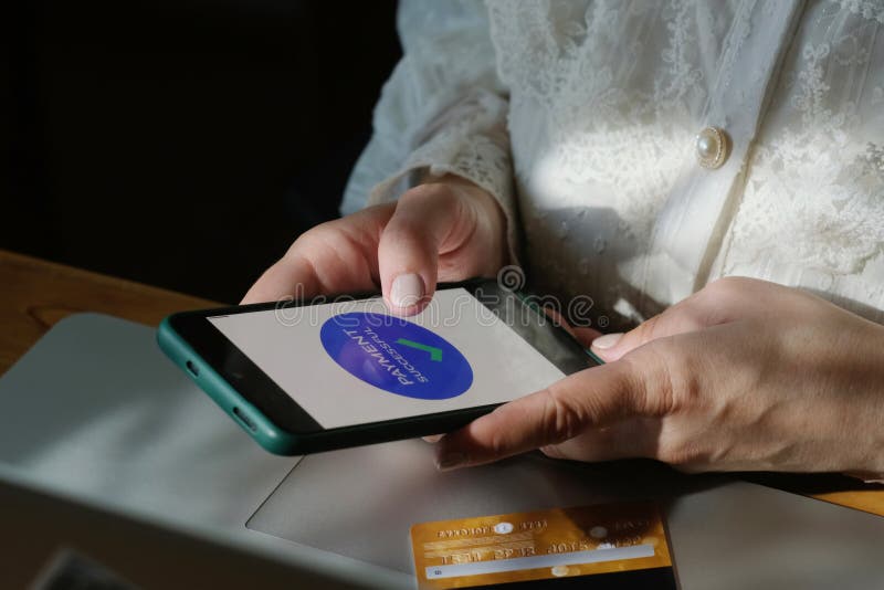 Making Online Payments with Smartphone and Plastic Bank Card. Stock ...