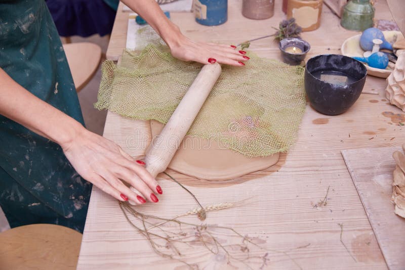 Making an Openwork Panel Made of Clay with a Knitted Napkin Stock Photo ...