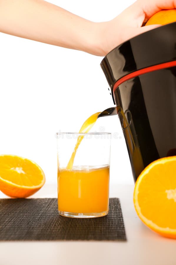 Making orange juice stock image. Image of sweet, orange - 129897