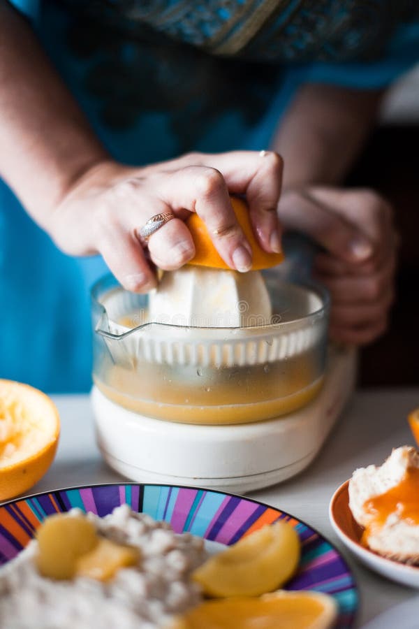 Making orange juice stock image. Image of sweet, orange - 129897