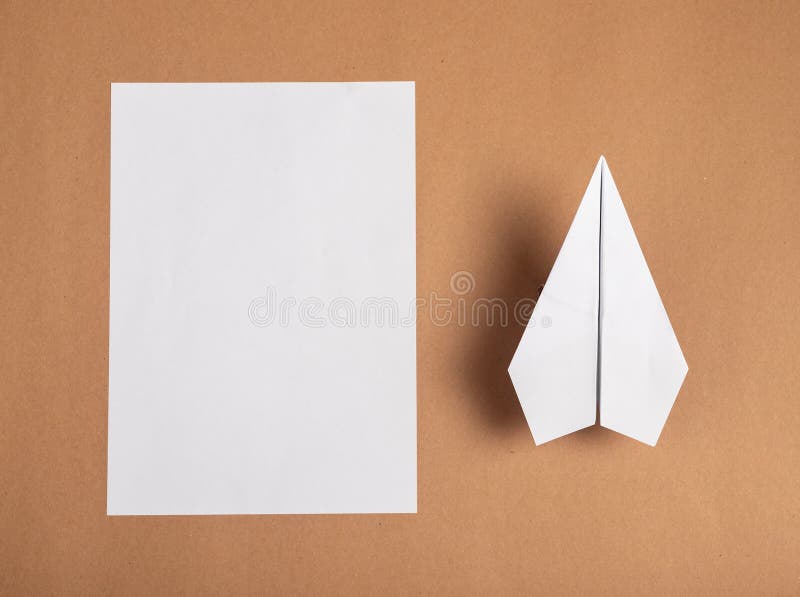 Making Origami Plane from White Paper Sheet. Creating, Development ...