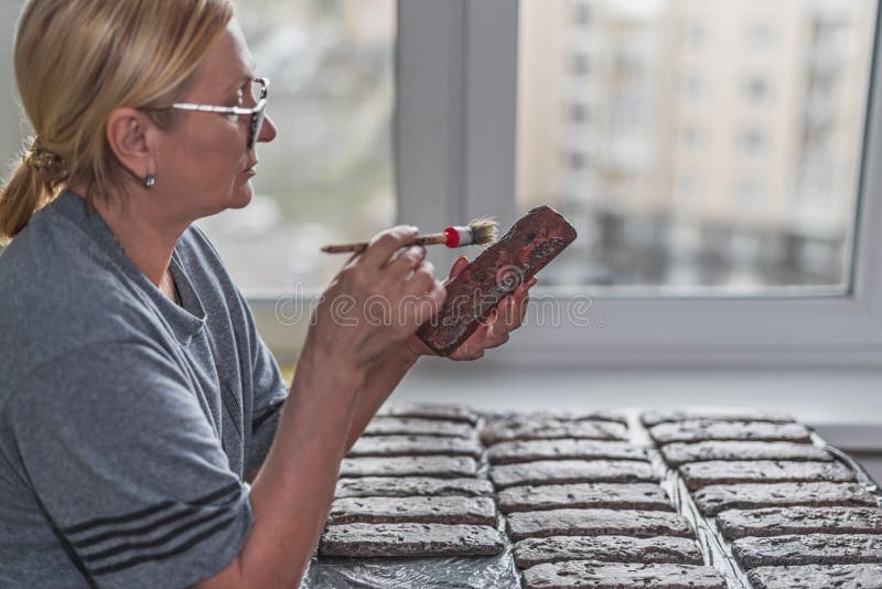 Making and Painting Decorative Bricks at Home. Handmade Work Stock ...