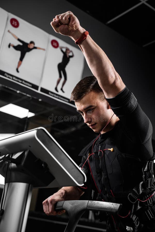Making Physical Exercises Using EMS Suit in Gym. Sport Training in ...