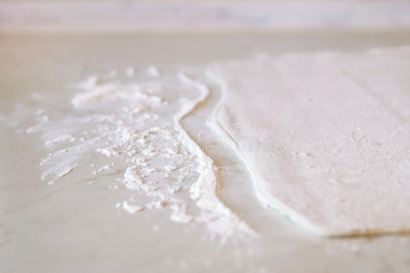 Making Pie. Rolled-out Dough on a Floured Surface. Photo with Selective ...