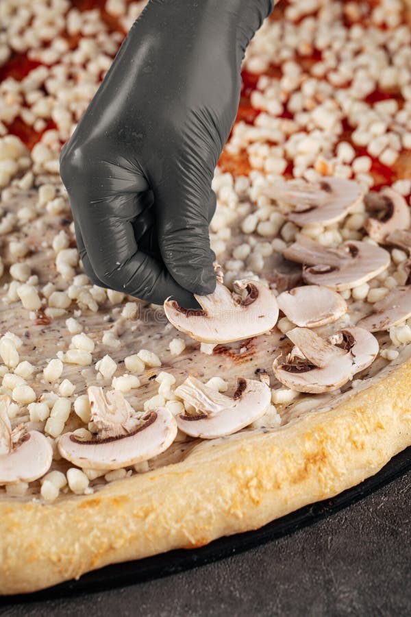 Making a Pizza Putting Mushrooms on a Dough Stock Image - Image of ...