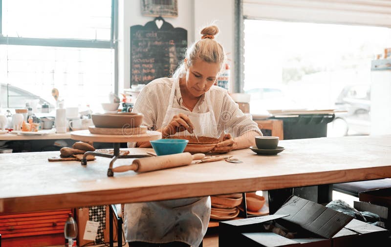 Making Pottery is Wonderful Therapy. a Female Artisan Working in Her ...