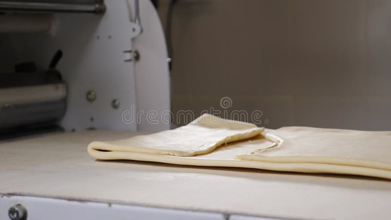 Making Puff Pastry. Modern Bakery Working Process Stock Footage - Video ...