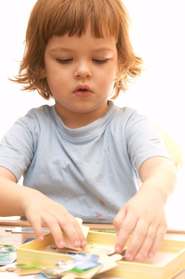 Making puzzle stock image. Image of concentration, making - 2187037