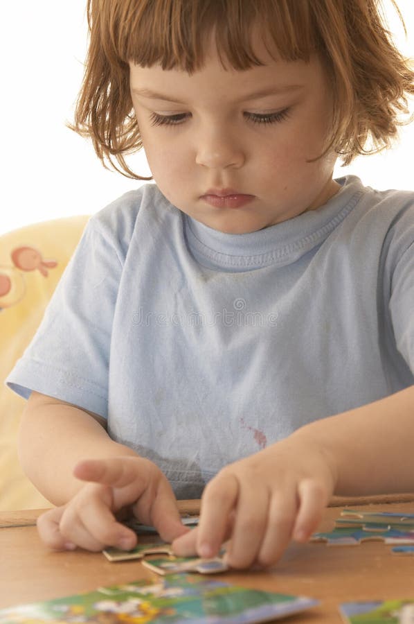 Making puzzle stock image. Image of concentration, playing - 2187159