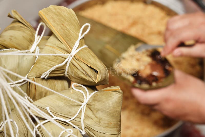 Making rice dumpling stock photo. Image of glutinous - 119530726