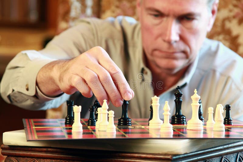 Making the Right Move stock photo. Image of chessboard - 12162194