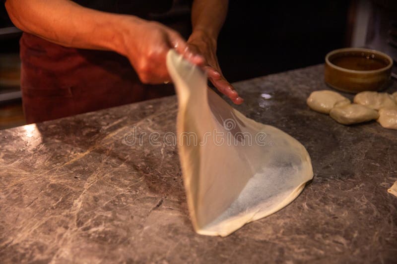 Making Roti Canai or Paratha Stock Photo - Image of close, cooking ...