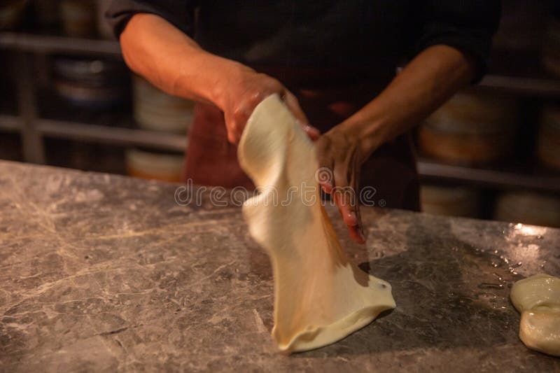 Making Roti Canai or Paratha Stock Photo - Image of indian, making ...