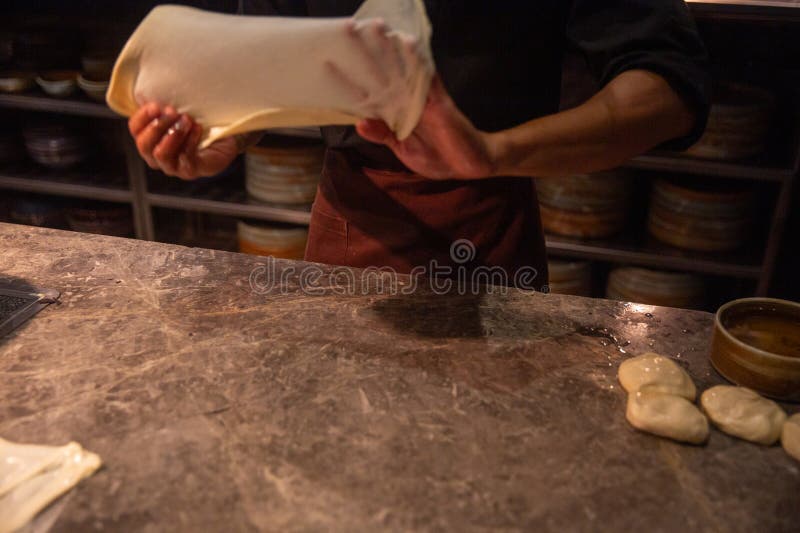 Making Roti Canai or Paratha Stock Image - Image of indian, cooking ...