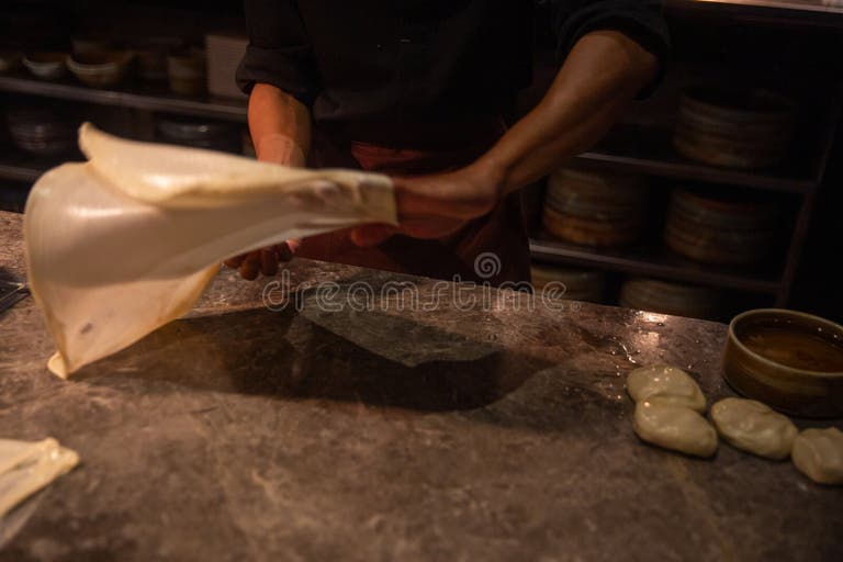 Making Roti Canai or Paratha Stock Image - Image of food, cooking ...