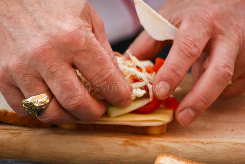 Making a sandwich stock image. Image of cooking, hands - 14258941