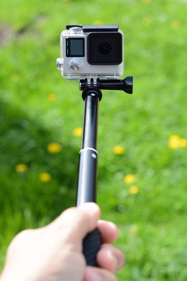 Making a Selfie with a Camera and Stick Stock Photo - Image of holding ...