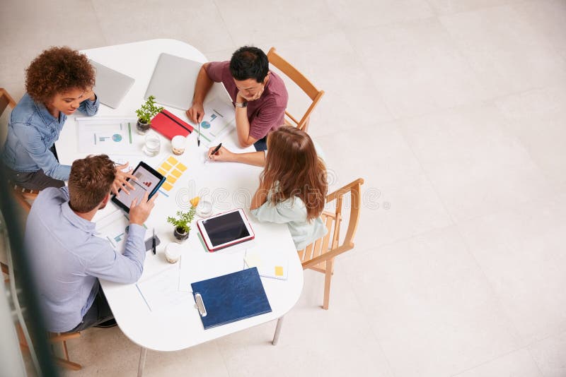 Making Sense of Figures and Data. High Angle Shot of a Group of ...