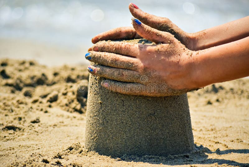 Making shapes of sand stock image. Image of seaside, game - 65769923