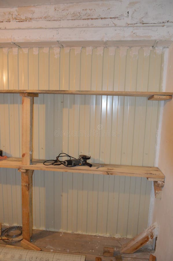 Making a Shelf Rack from Lumber of Long Boards Stock Image - Image of ...