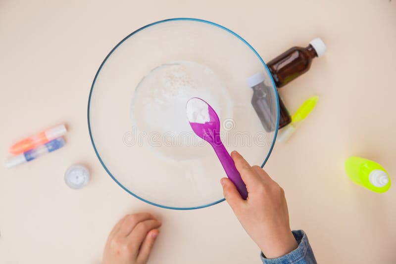 Making Slime, Step by Step Instruction, Step Two, Adding Soda. Stock ...
