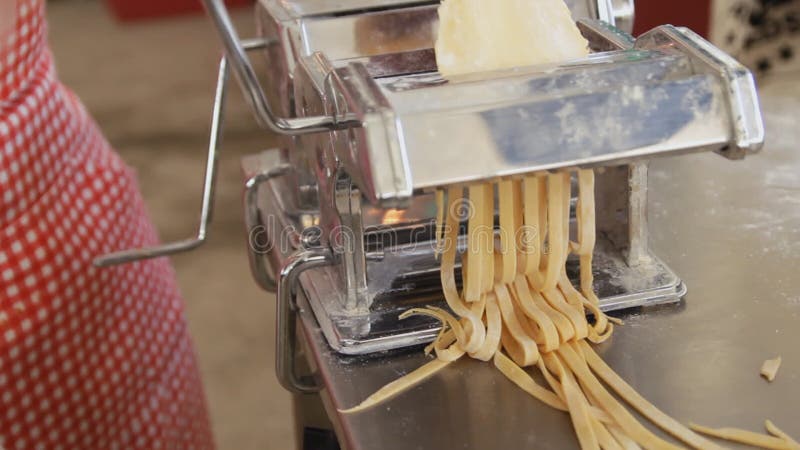 Making Spaghetti with a Traditional Style Pasta Machine. Cooking ...