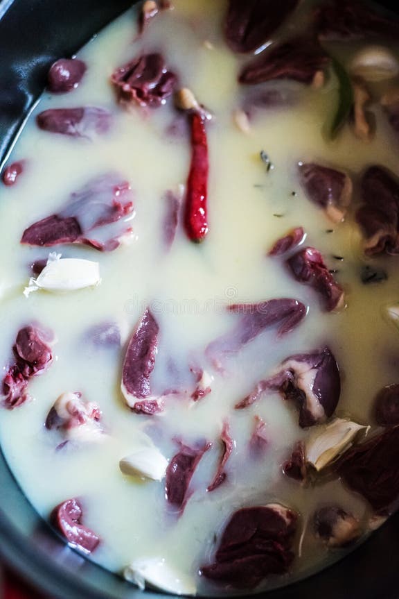 Making Stew of Duck Hearts and Garlic Stock Image - Image of outdoors ...
