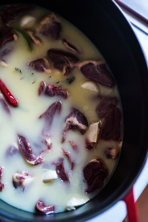 Making Stew of Duck Hearts and Garlic Stock Image - Image of iron, leaf ...