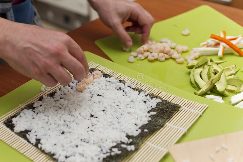Making sushi stock photo. Image of preparation, nori - 94315360