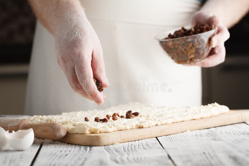 Making Sweet Raisin Dough, Hands Dusting Dough Ball with Flour Stock ...