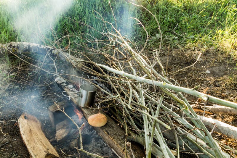 Making Tea at the Bonfire. Making Coffee. Landscapes. Stock Image ...