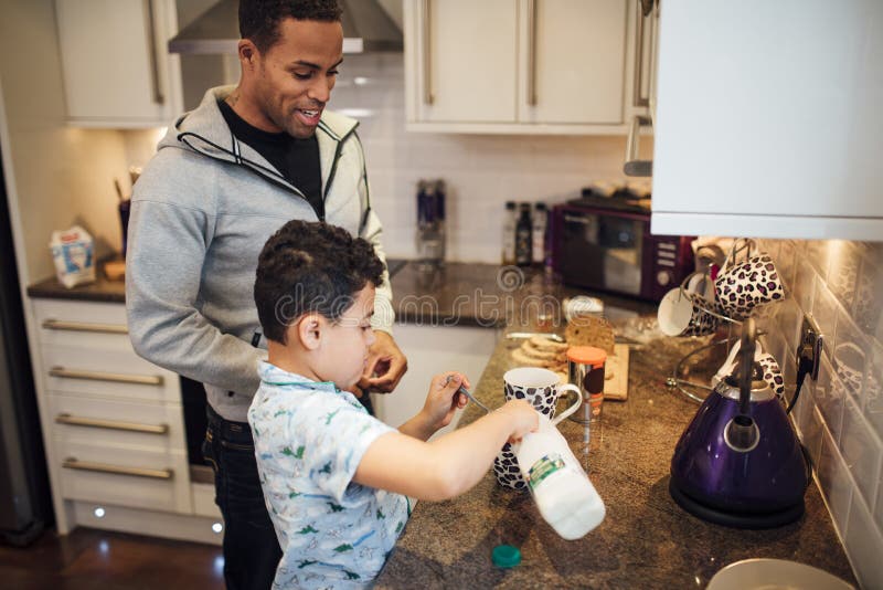 Making Tea with Dad in the Morning Stock Photo - Image of childhood ...