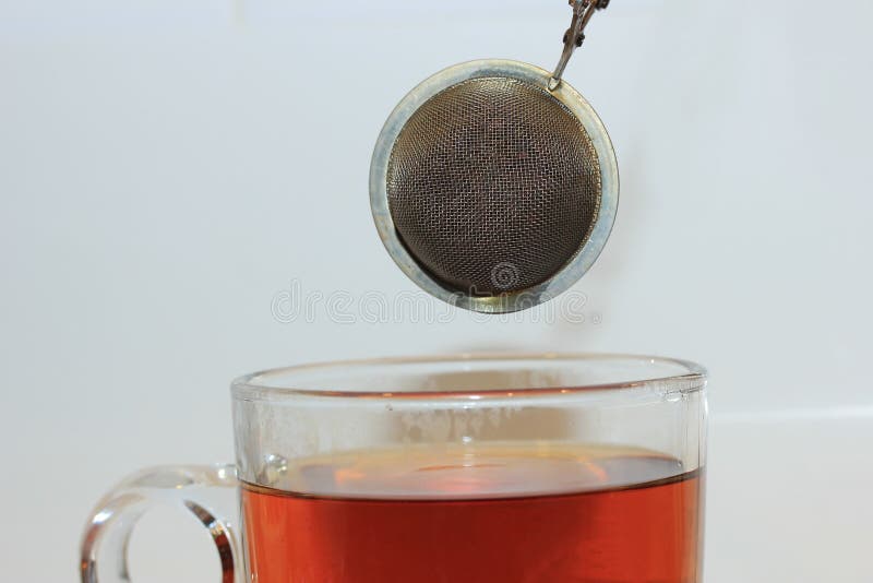 Making tea with infuser stock photo. Image of brew, natural - 221610330