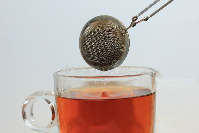Making tea with infuser stock photo. Image of breakfast - 90575642