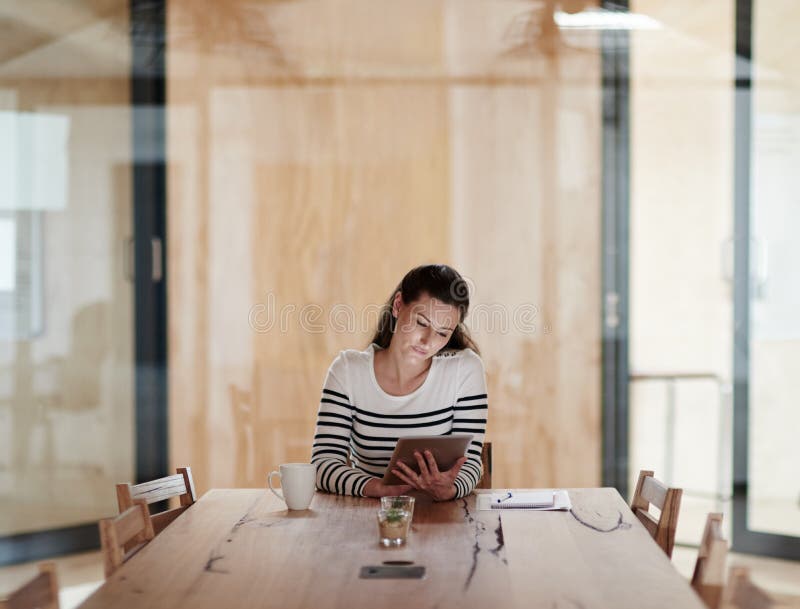 Making Technology Work for Her. a Businesswoman Using a Digital Tablet ...