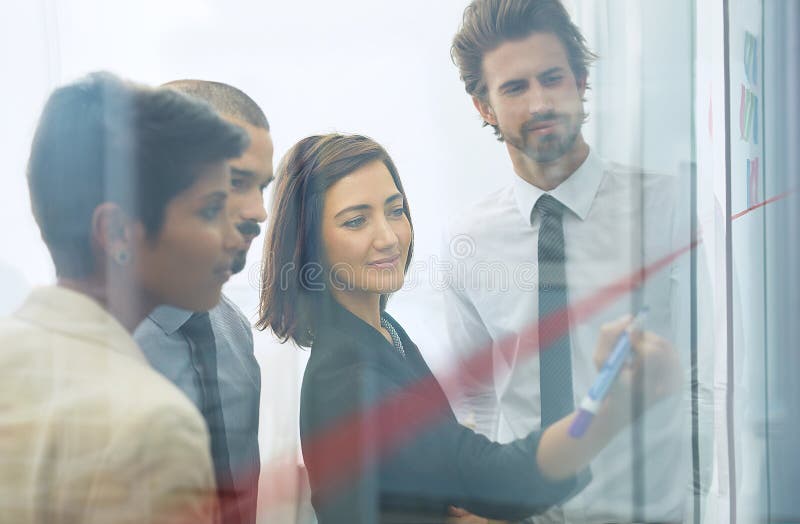 Making Their Ideas Visual. Colleagues Brainstorming in the Office ...