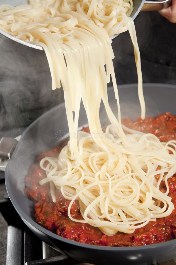 Making tomato pasta stock image. Image of paste, carbohydrates - 15616757