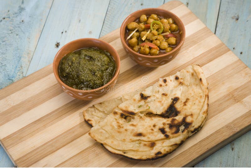 Makki Ki Roti with Channa stock photo. Image of onion - 36842414