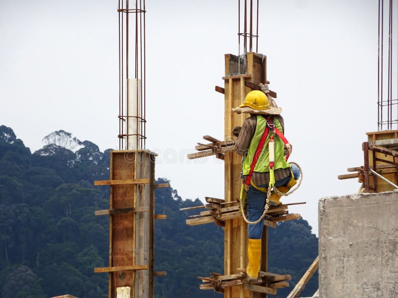 Construction Workers Working at Height at the Construction Site ...