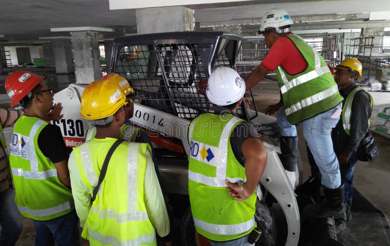 Construction Workers Having a Discussion at the Construction Site ...