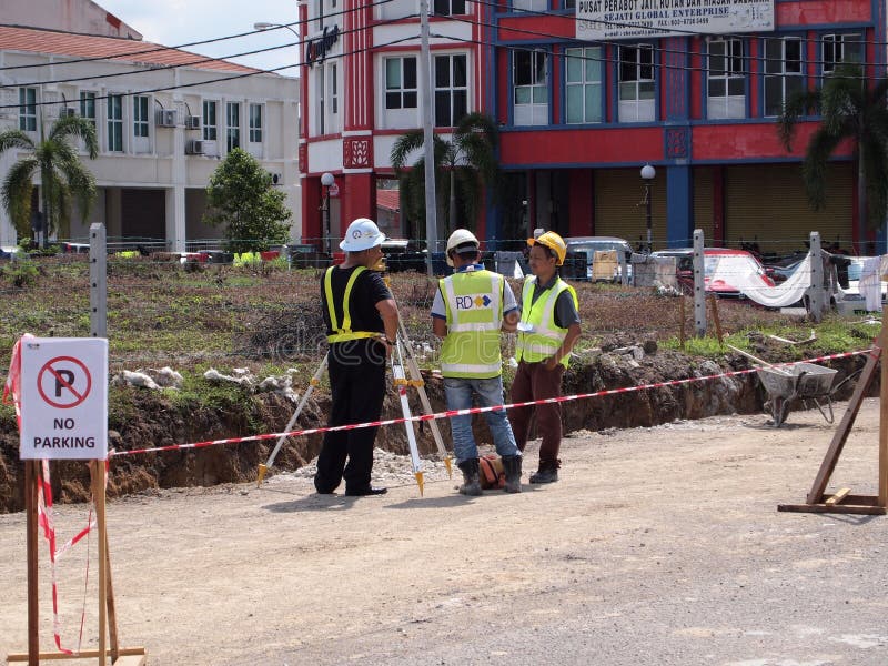 Construction Workers Having a Discussion at the Construction Site ...