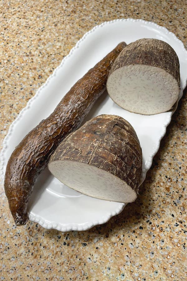 Malanga Taro Cut in Half on a White Plate Stock Photo - Image of ...