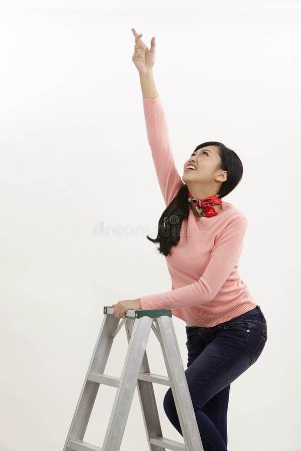 135 Asian Woman Climbing Ladder Stock Photos - Free & Royalty-Free ...
