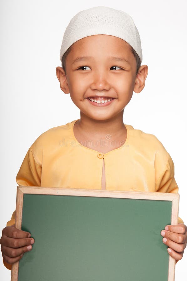 Cute Muslim Boy stock photo. Image of board, malay, green - 29744312