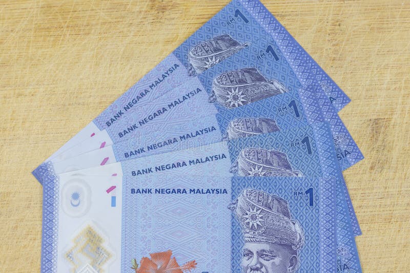 Malaysian Ringgit Currency Notes Fan Display on a Wooden Background ...