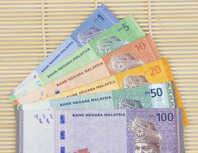 Malaysian Ringgit Currency Notes Fan Display on a Wooden Background ...