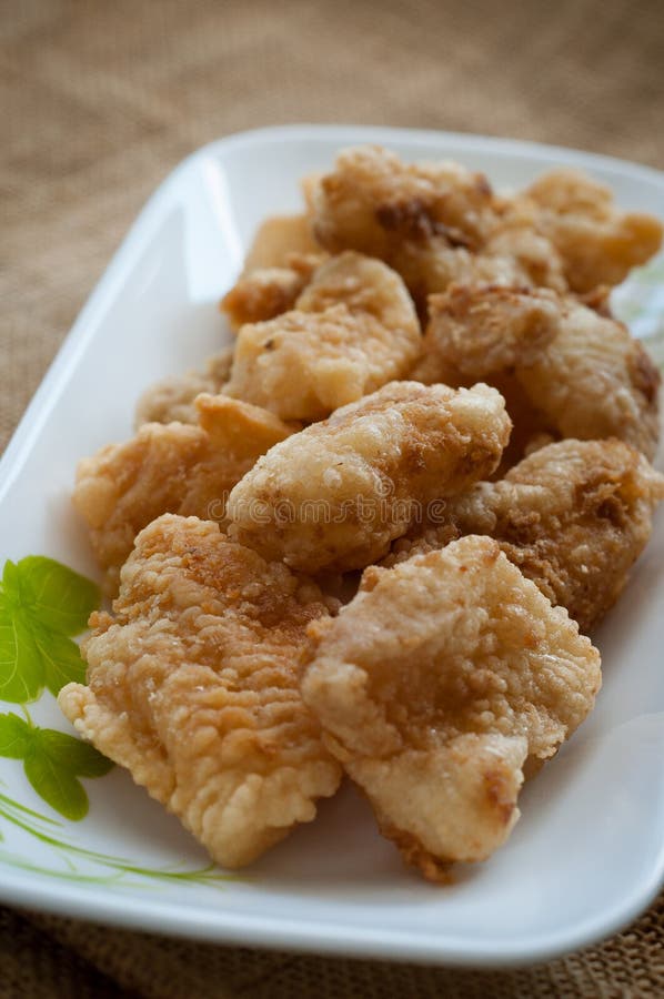 Malaysian Style Battered and Deep Fried Dory Fish Cubes. Stock Image ...