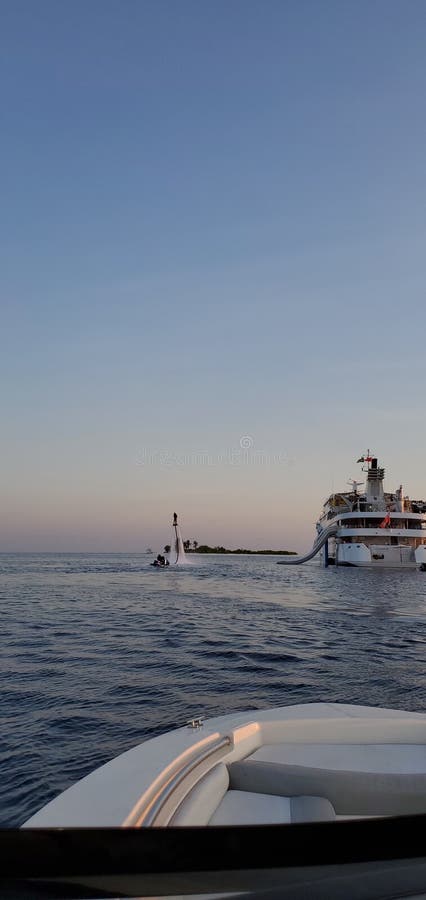 Maldives fly borders stock photo. Image of water, reflection - 218871448