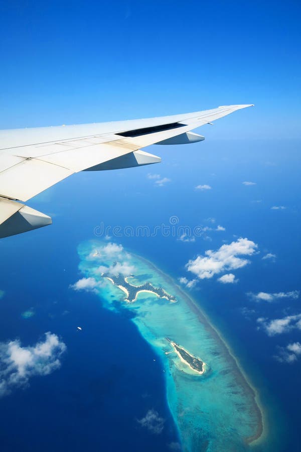 Maldives Islands Top View and Airplane Wing Stock Photo - Image of ...